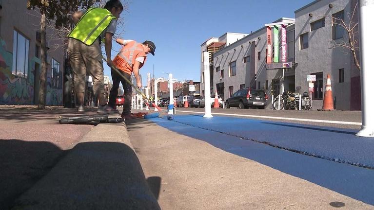 Street murals enhance ‘pedestrian buffers’ along Santa Fe Drive