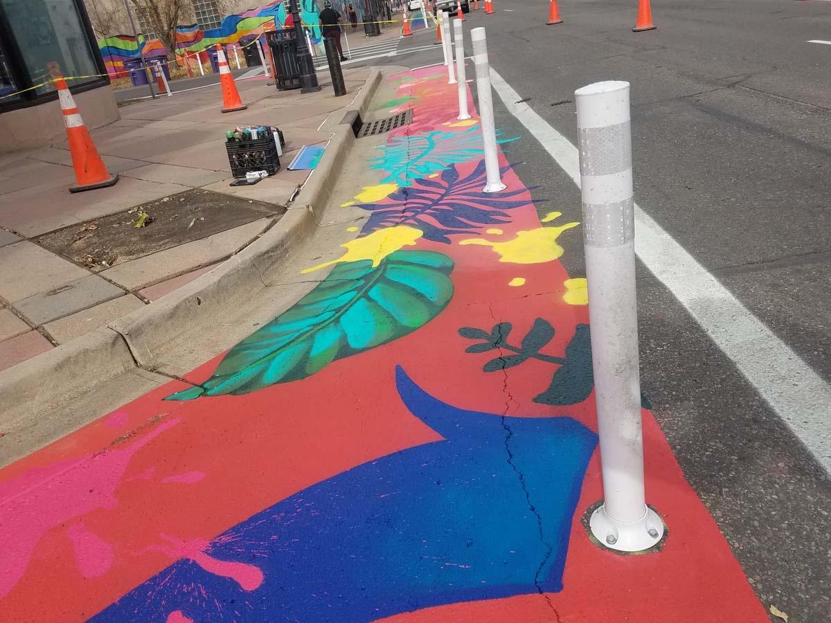 Street murals enhance ‘pedestrian buffers’ along Santa Fe Drive