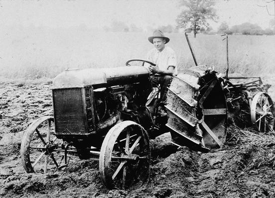 Man Seated In The Fordson, The First Ford Tractor | Industrial ...
