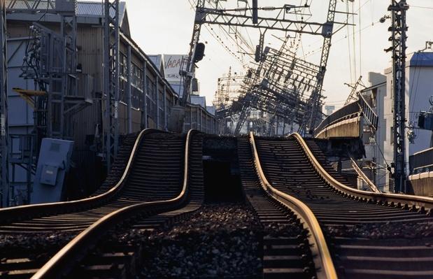 Train tracks and electricity poles damaged after earthquake | Natural ...