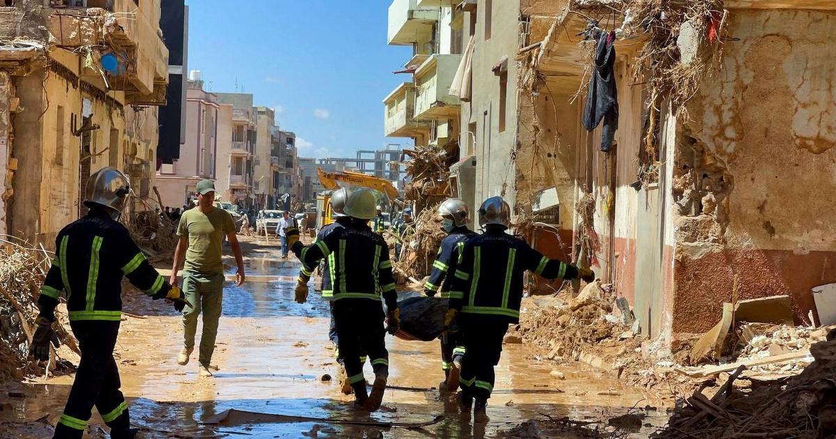 PBS News Hour | Aid workers struggle to reach flooded city in Libya ...