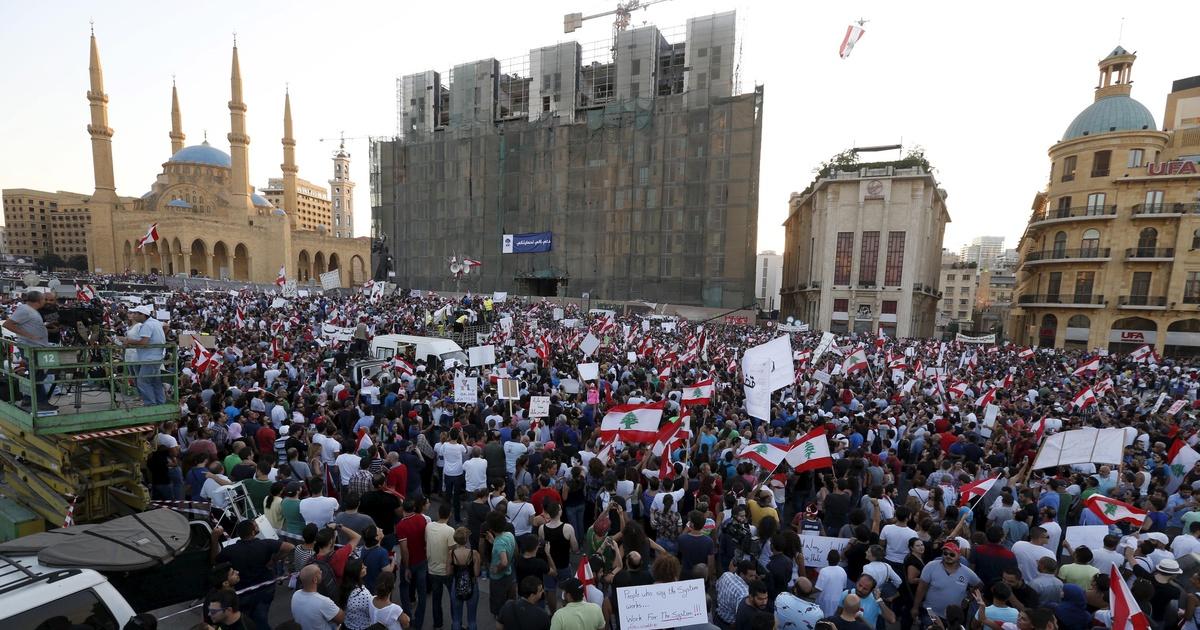 PBS News Hour | Thousands take to Beirut streets to protest government ...