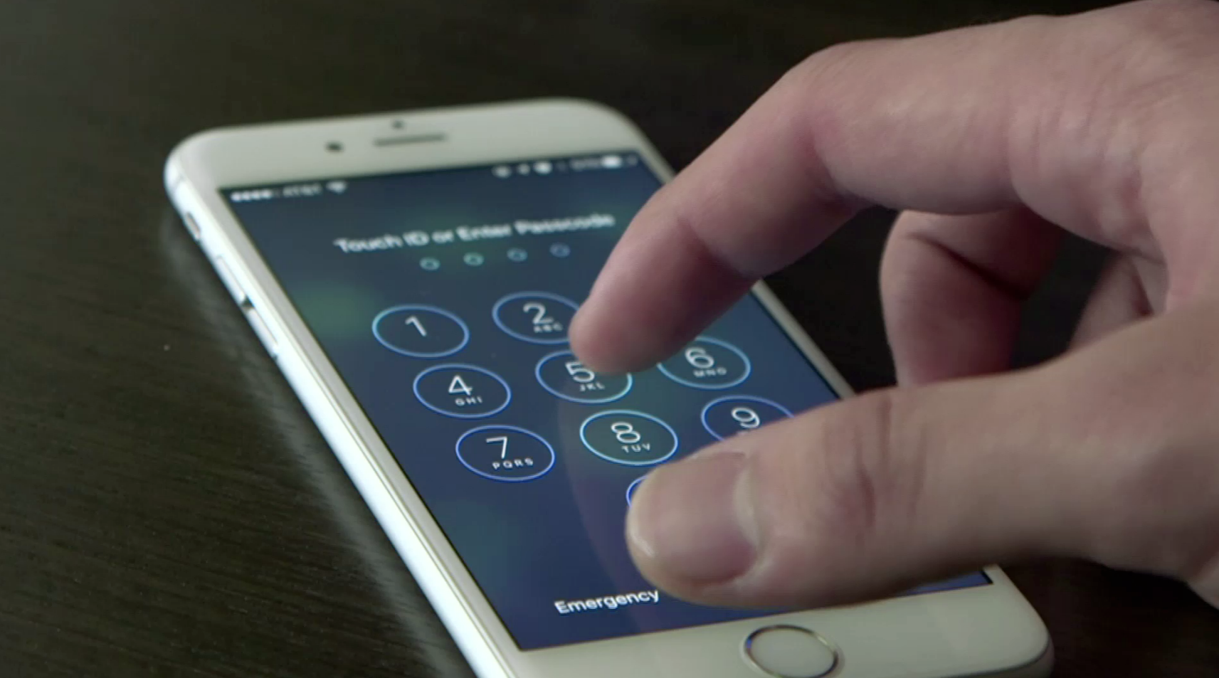 PBS News Hour - Breaking into iPhone may help find Louisiana killer ...