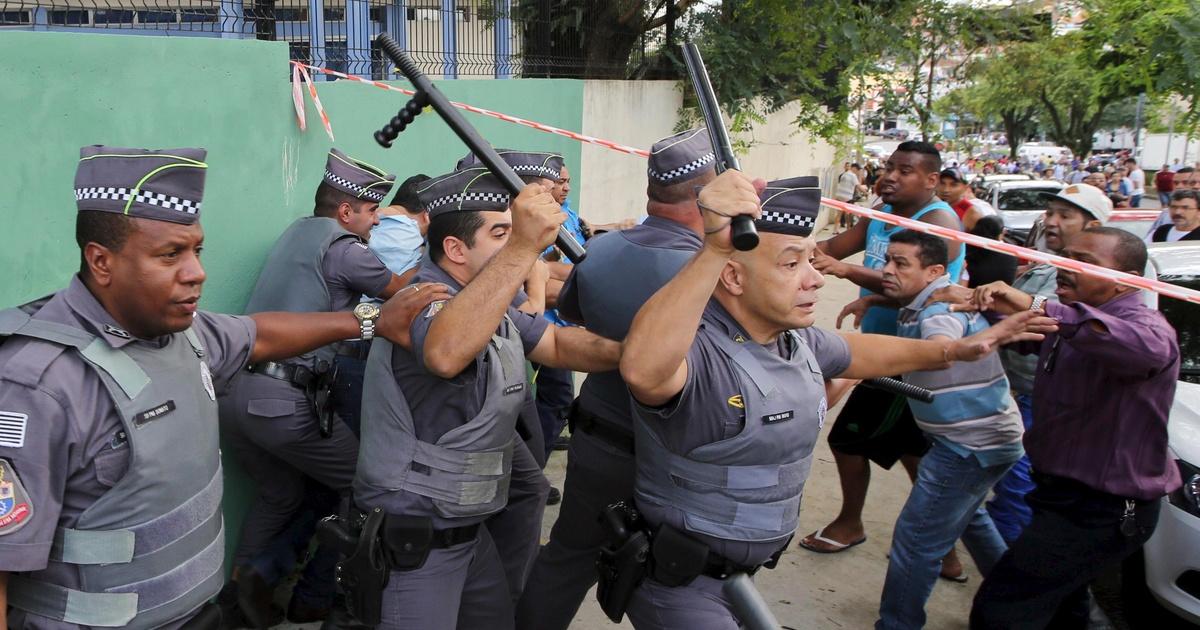 PBS News Hour | Violence flares in Rio’s slums months before Summer ...