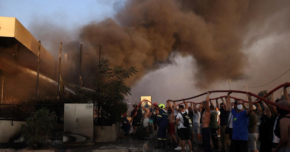 PBS News Hour | Wildfires burn near Athens after prolonged drought in ...