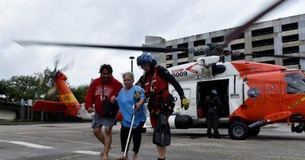 PBS NewsHour | Hurricane rescue crews face 'more calls than capacity ...
